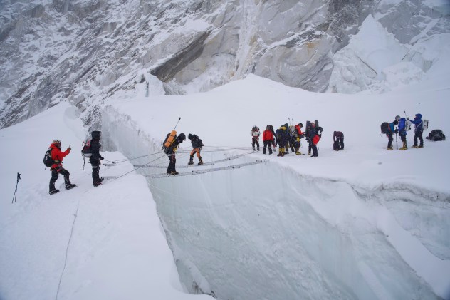 Mount Everest's brief spring weather window brings a rush to the summit