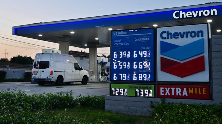 Soaring fuel costs draw attention to higher prices at name-brand gas ...