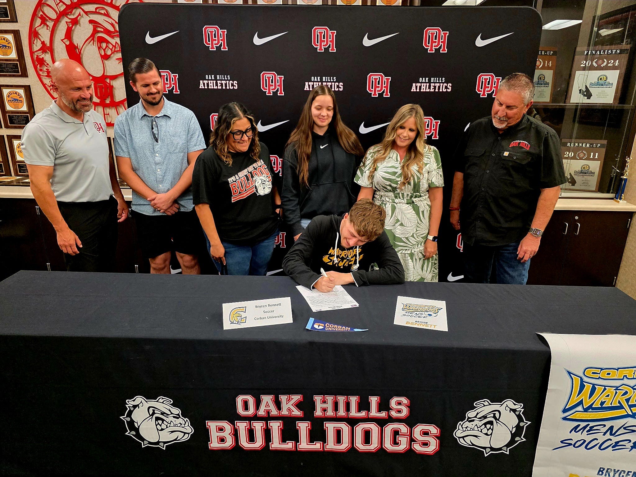 Four Oak Hills athletes sign to compete at the college level next fall
