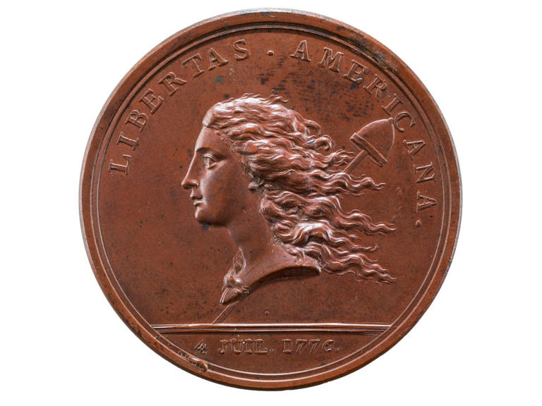 Benjamin Franklin styled Lady Liberty’s look in this medal he ...