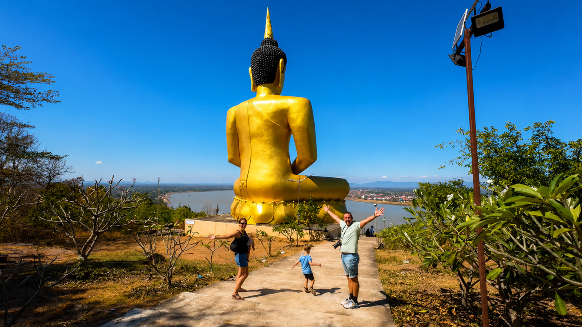 Why is this giant golden Buddha famous in Laos?