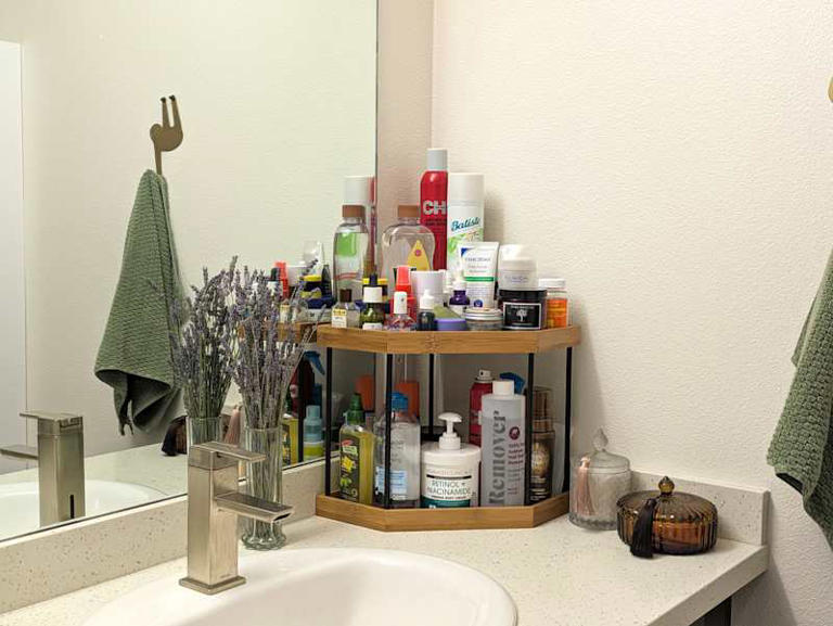 I put a $25 IKEA wood kitchen organizer in my bathroom (it's so smart!)