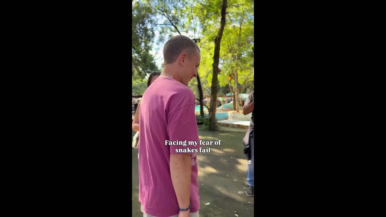 'Nope!' man startled when snake around his neck suddenly hisses