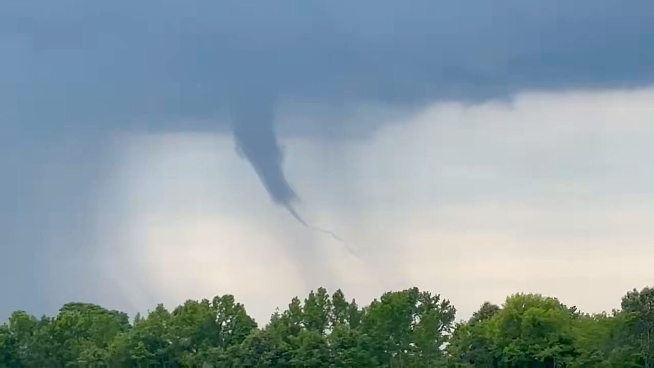 A terrifying rope tornado is captured making landfall in Arkansas
