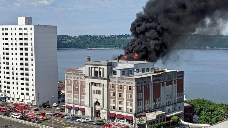 Two-alarm fire reported in Tacoma, crews tackle rooftop deck blaze