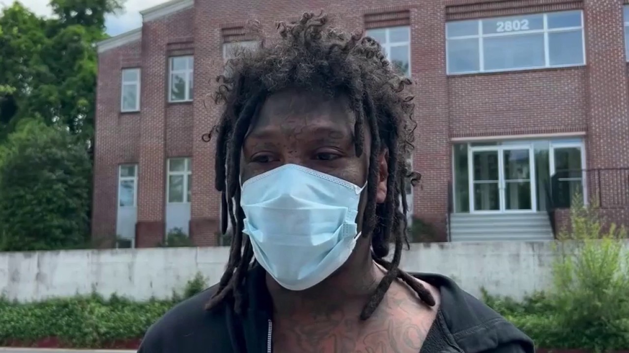 Atlanta tattoo artist says he was shot twice while riding scooter