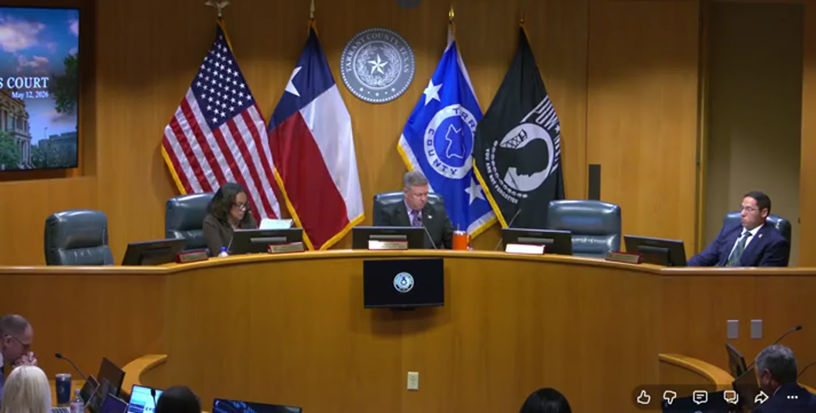 O'Hare gavels out commissioners court while Simmons speaks