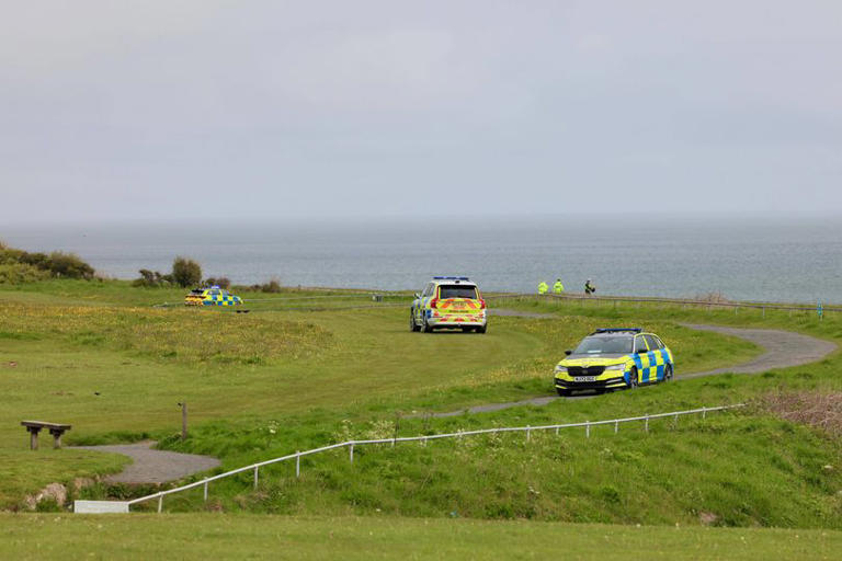 Van goes over edge of cliff at popular UK beach as major police ...