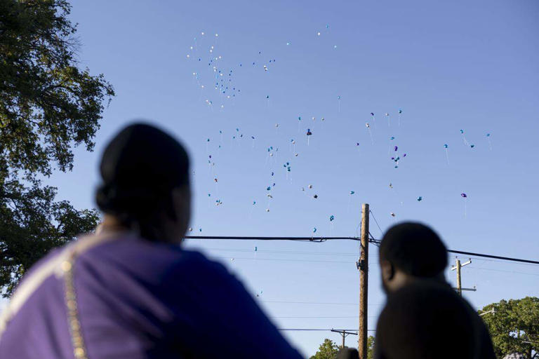 'He was love': Friends, family hold vigil to honor security guard ...