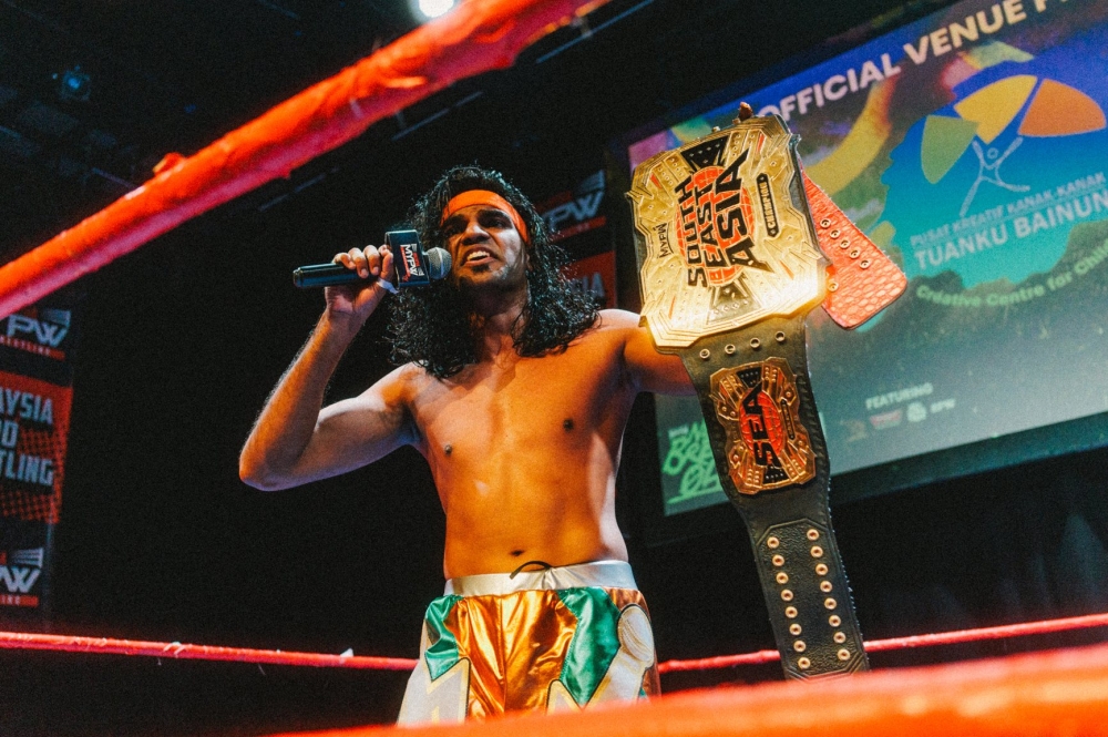 Malaysian pro wrestler Miles Karu takes SE Asia title and wrestling ...