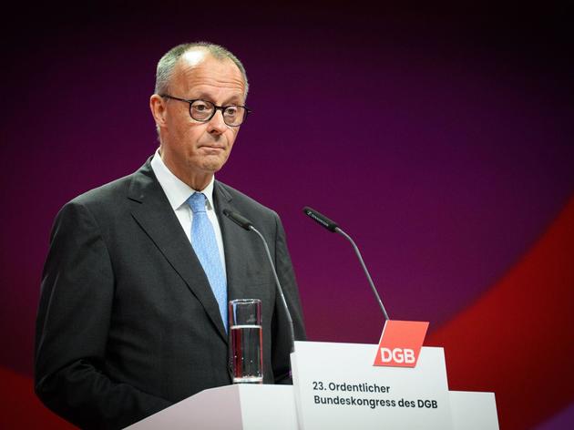 Buhrufe für Merz beim DGB – DGB-Chefin: „Beschäftigte sind nicht schuld ...
