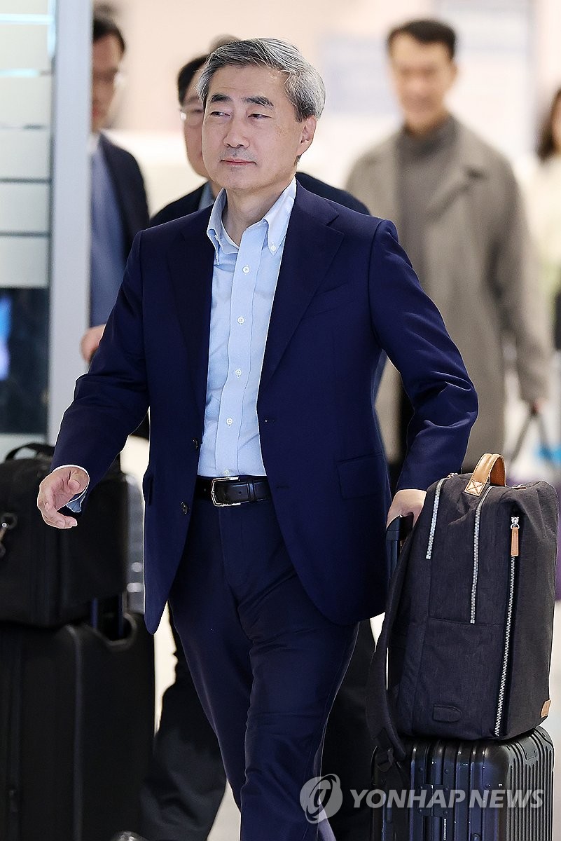 Central banker returns home