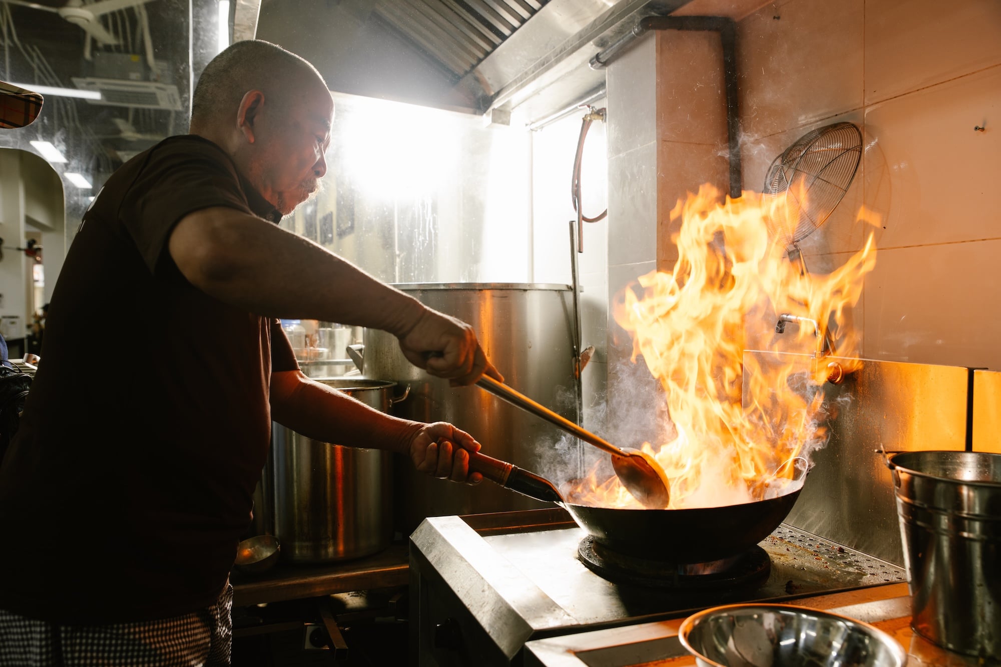 A new style of wok-seared garlic beef pho arrives in Falls Church