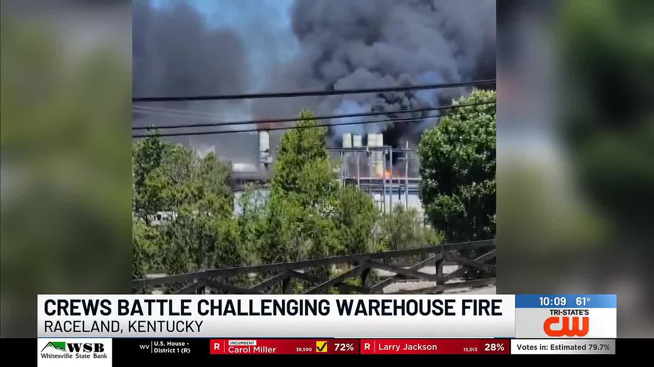 Crews battle challenging warehouse fire