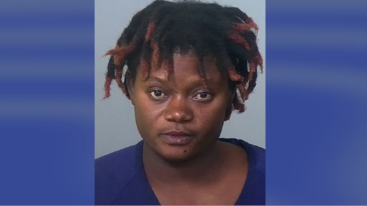 Police: Woman was looking at cellphone while 4-year-old daughter drowned