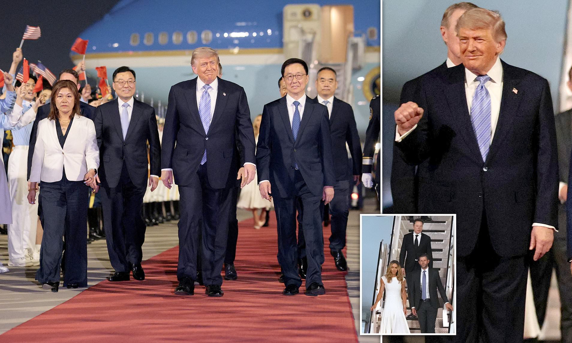 Trump smiles and fist pumps as he's greeted by 300 chanting Chinese ...