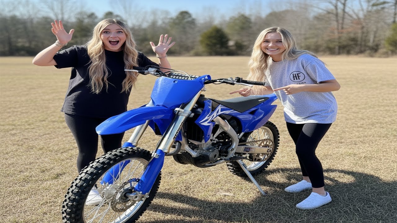 Twins enjoy their new dirt bike