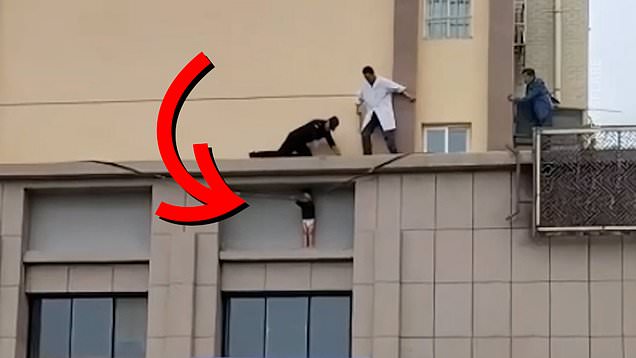 Hero officer helps rescue kid stuck on ledge