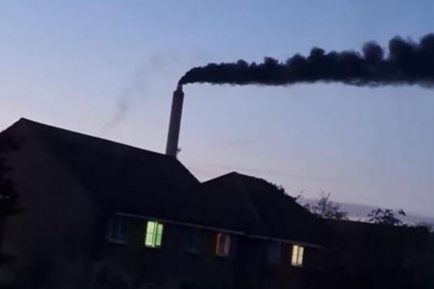 Video shows thick black smoke billowing from oil refinery
