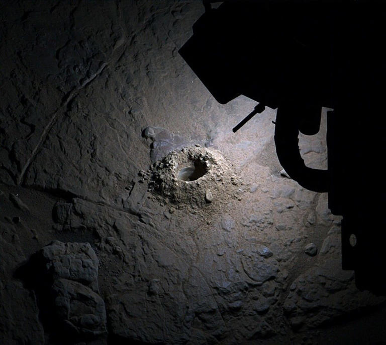 NASA’s Curiosity rover accidentally pulled up a 29-pound Mars rock that ...