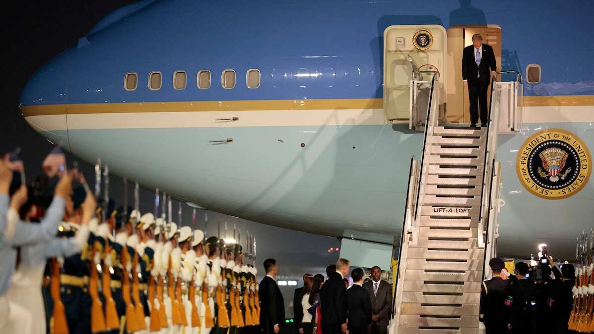 Trump lands in China before Xi summit, impeachment and a failed arrest ...