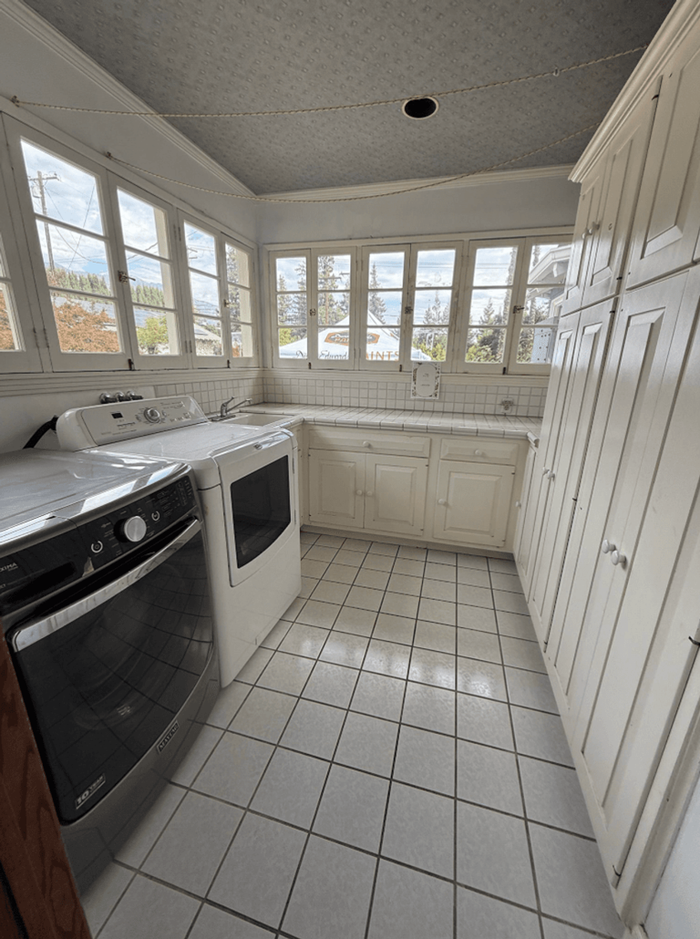 This rose mauve & green paint combo just upgraded the humble laundry room
