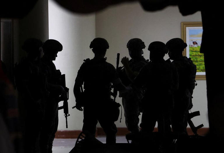 Gunshots fired in standoff at Philippine Senate over ICC suspect