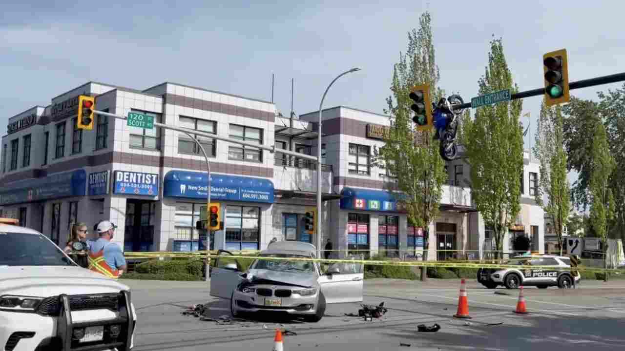 Video: Crash in Canada leaves motorcycle hanging from traffic light