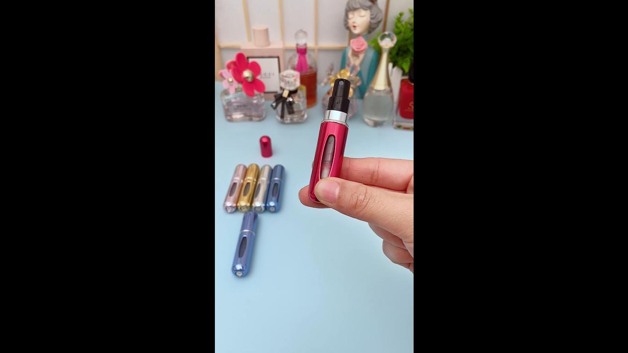 Using portable perfume atomizer bottle for easy travel refill resulting ...