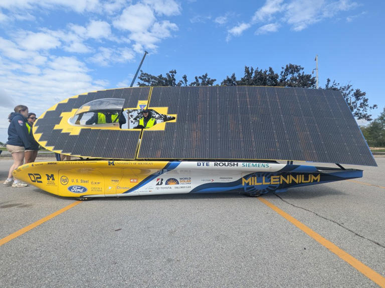 Sun-powered car, built by University of Michigan students, makes a pit ...