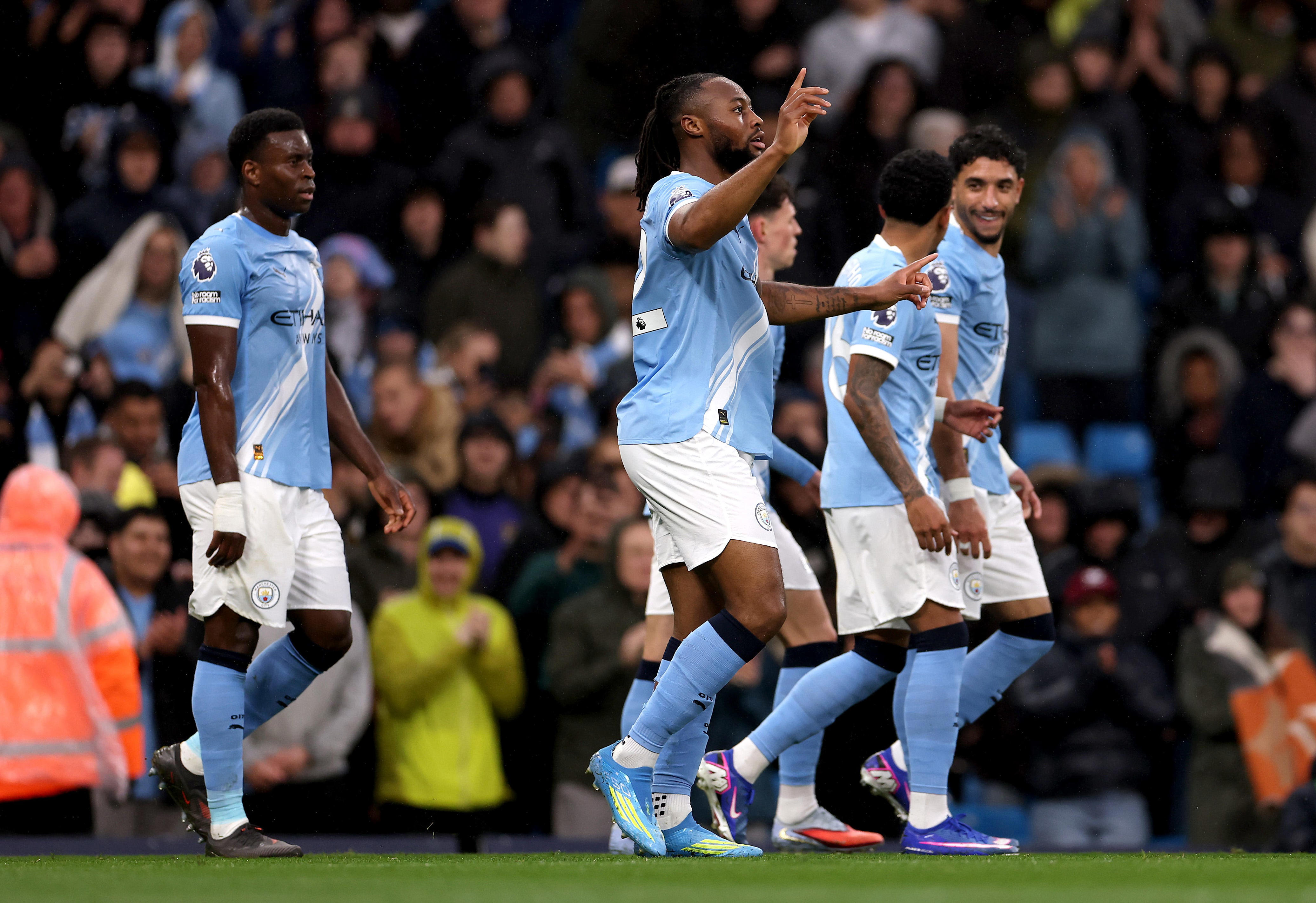 Manchester City crushes Crystal Palace to keep pace with Arsenal in ...