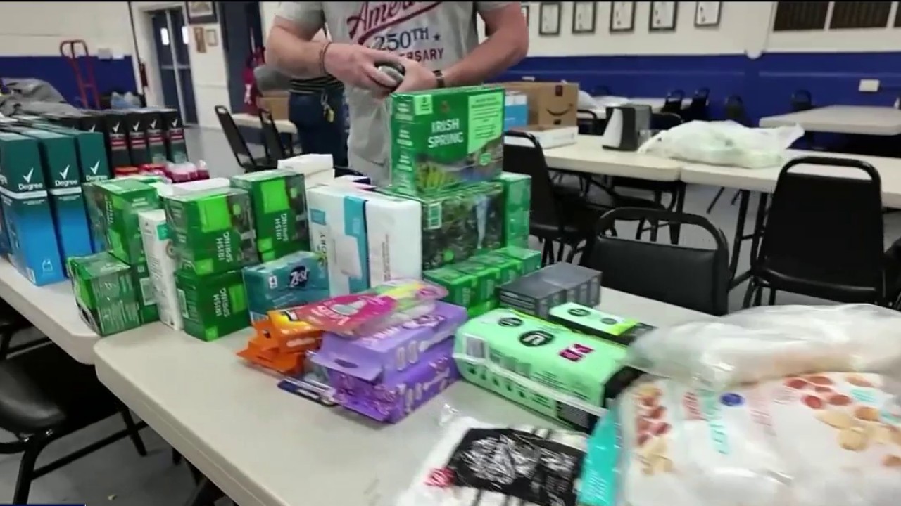 Newnan volunteers pack 100 care packages for overseas troops