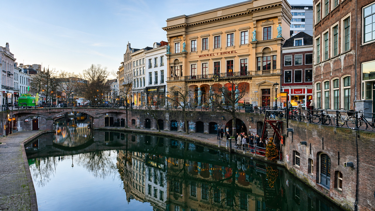 Utrecht canal walk with reflections and historic city views