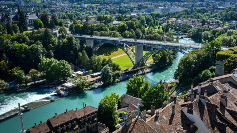 Switzerland’s summer hack: People swim through a river to get home from ...