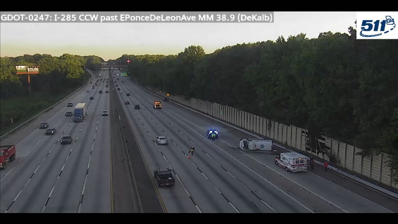 Ambulance flips on I-285 in DeKalb County, blocking several lanes
