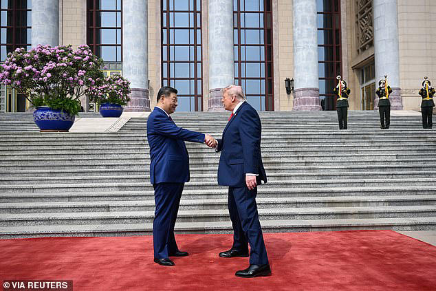 Trump's hidden five-tap code in handshake with Xi