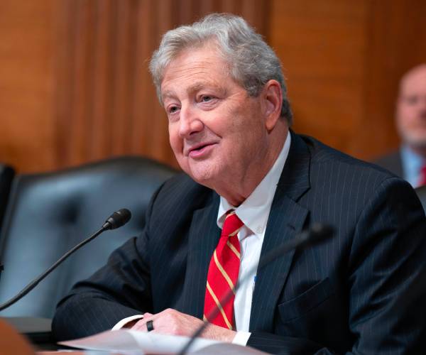 Senate advances shutdown pay freeze bill