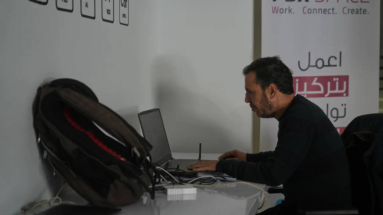 Gaza's digital workers continue coding amidst conflict and challenges