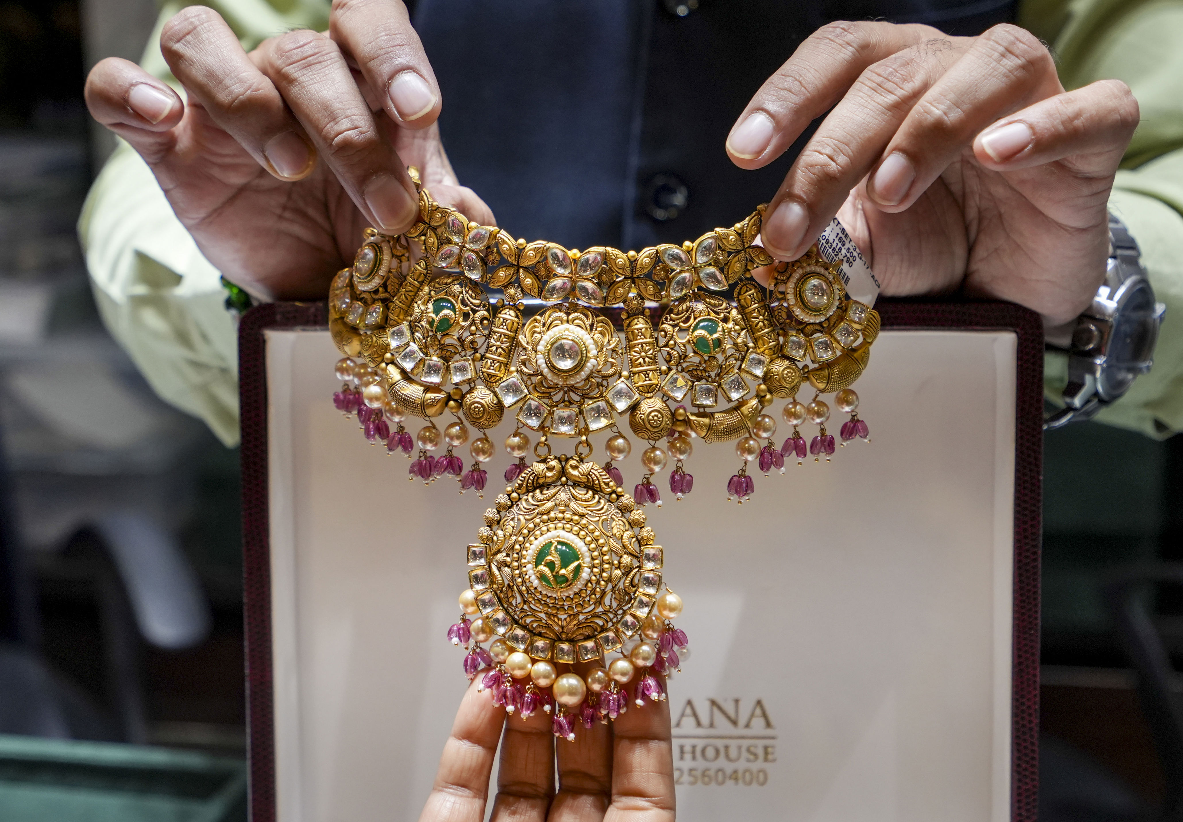 Gold futures rise Rs 598 in volatile trade amid tensions in West Asia