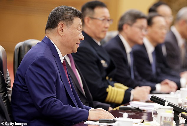 Trump's hidden five-tap code in handshake with Xi