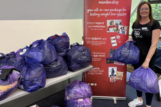 Slimming World group fills hundreds of bags with donations for Cancer ...
