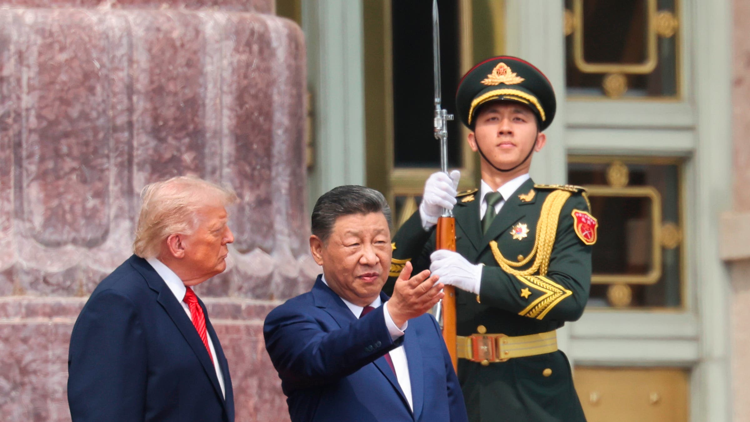 Trump offers friendly words in Beijing while Xi issues cautionary warning