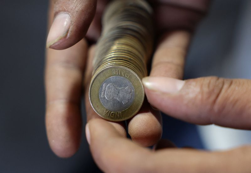 India rupee slips to record low as energy risks deepen, RBI likely ...