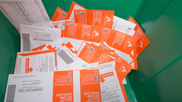 Election officials warn Oregon voters of possible delays for mail-in ...