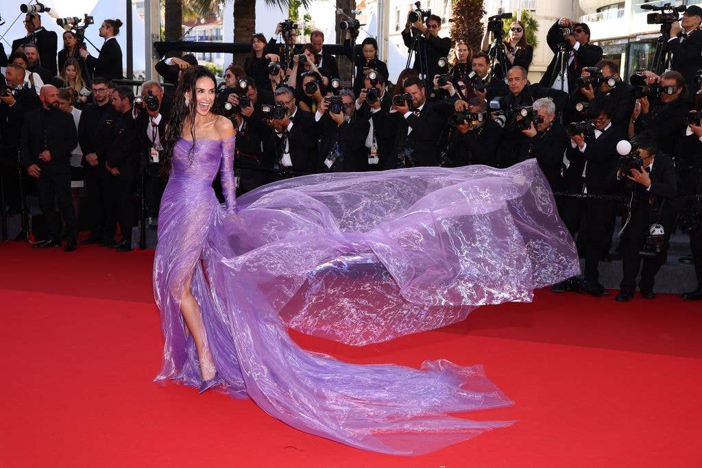 Demi Moore, 63, steals the show in glorious purple dress with long ...