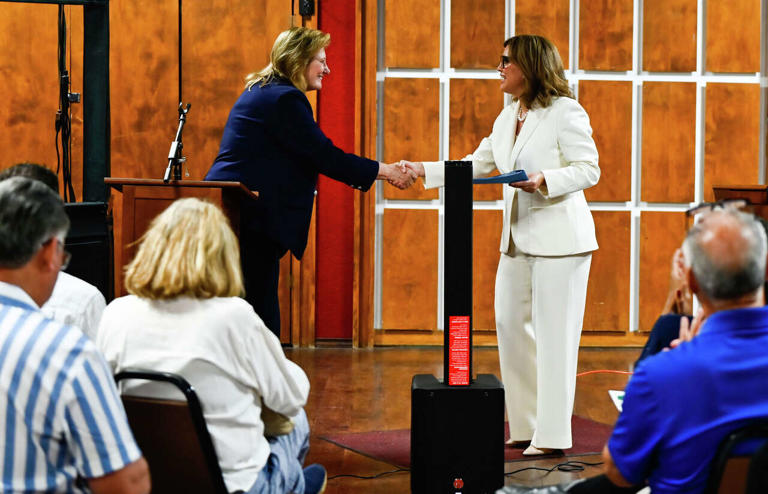 DA candidates in Democratic runoff clash over experience, case backlog