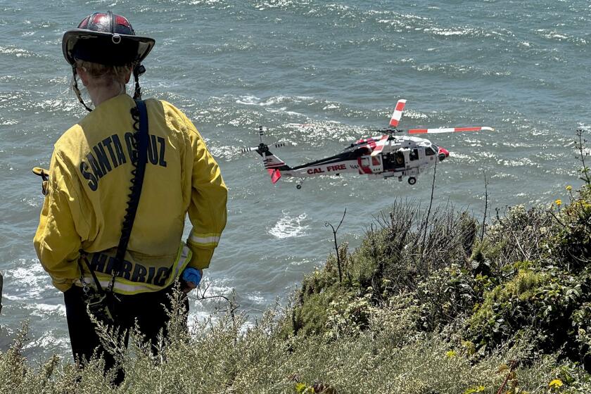 Man dies after car plunges 500 feet off Highway 1 cliff onto beach