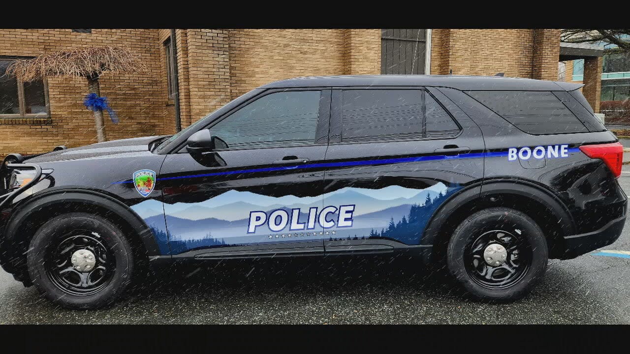 Man charged after armed robbery at Boone bank