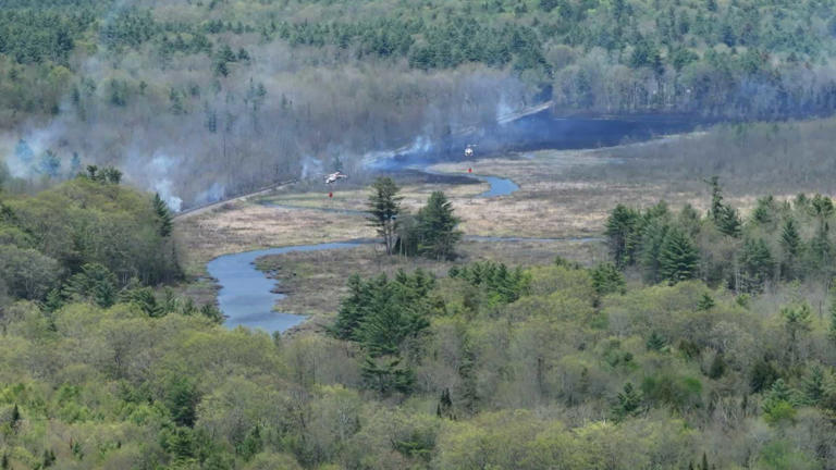 Crews from multiple departments battle Greene brush fire along railroad ...