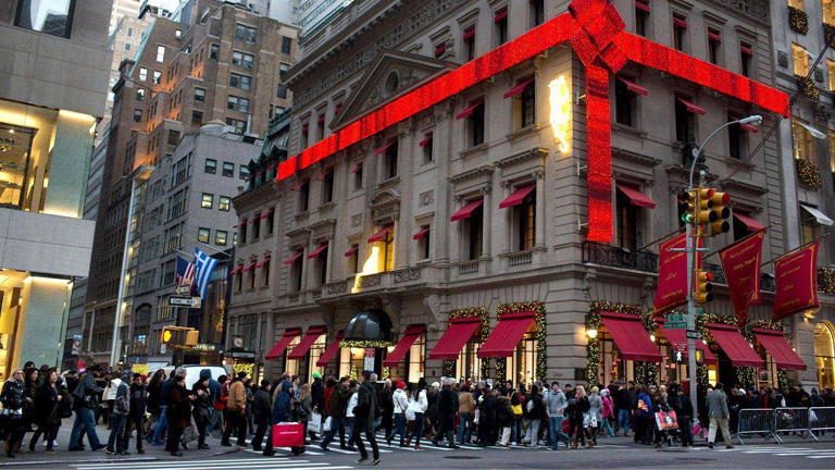 Woman dies after plunging into uncovered manhole outside luxury stores